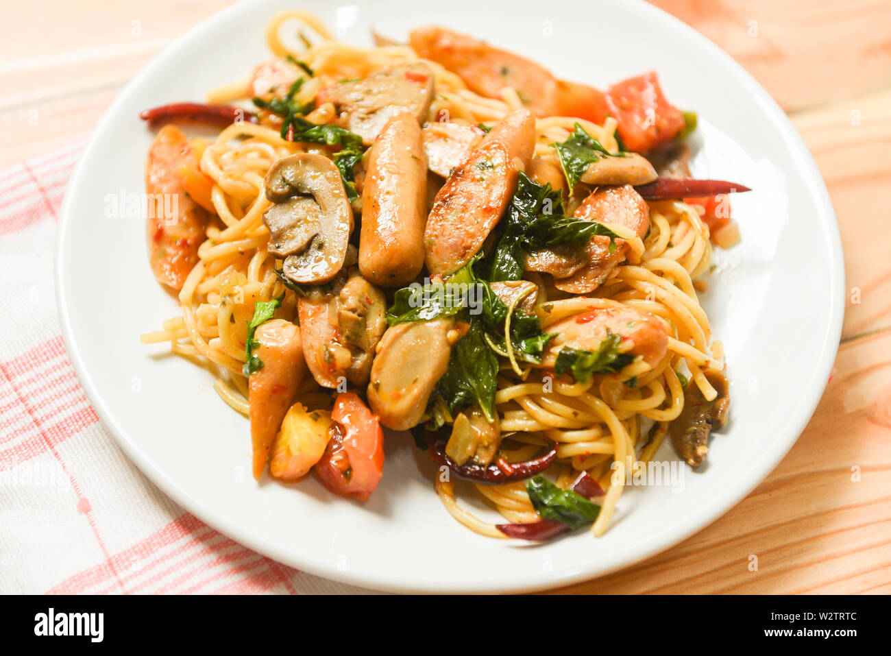 Hot and spicy Spaghetti Pasta tomato chilli and basil leaves top view ...