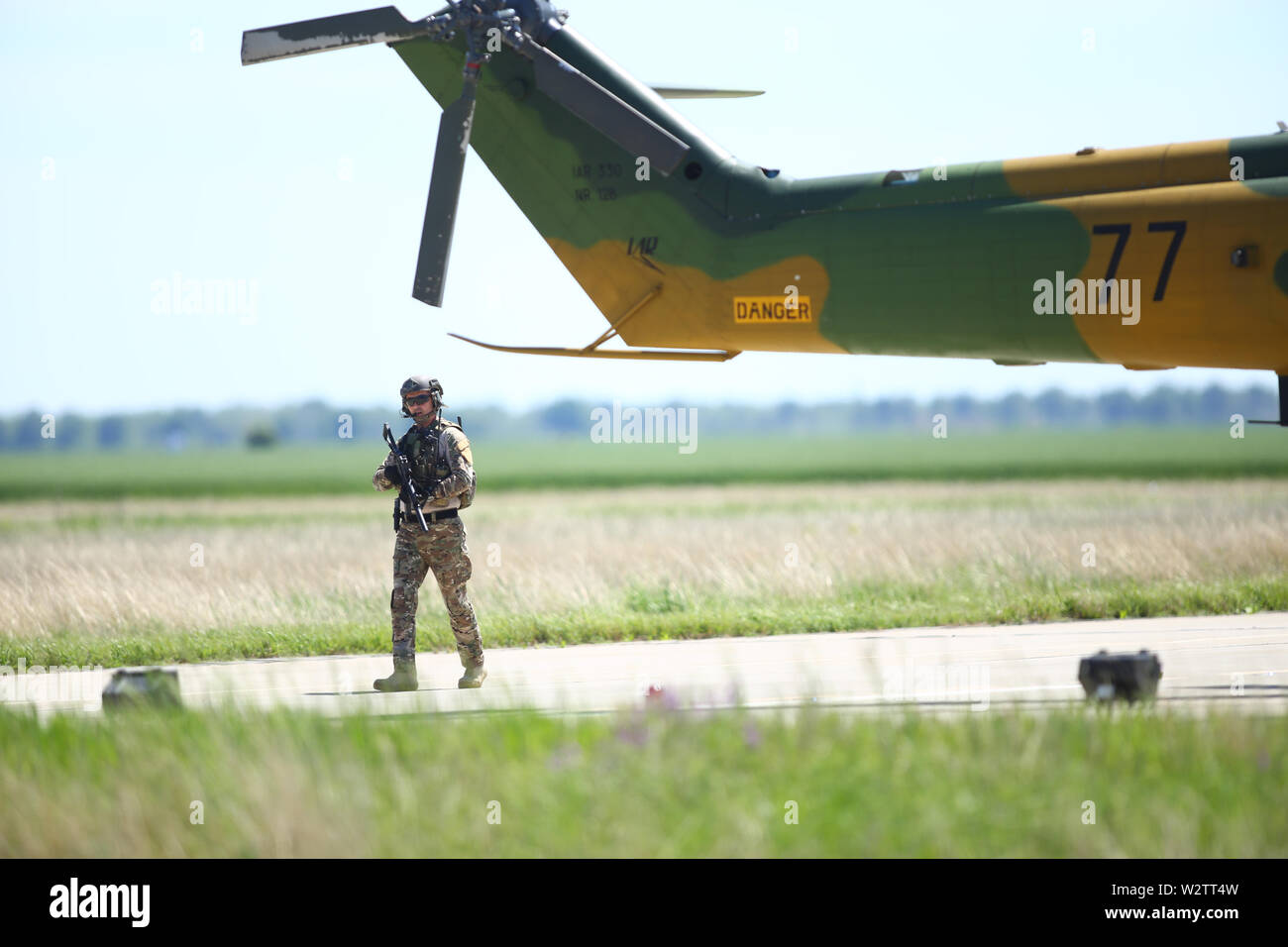 Boboc, Romania - May 22, 2019: Romanian army soldier patrols a military ...
