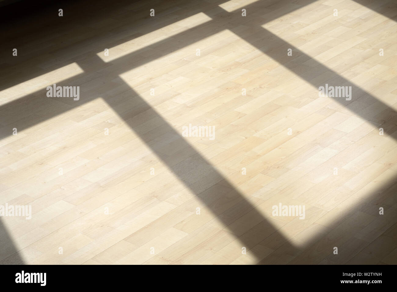 Wood flooring wooden wood parquet floor with sun shadow on timber ...