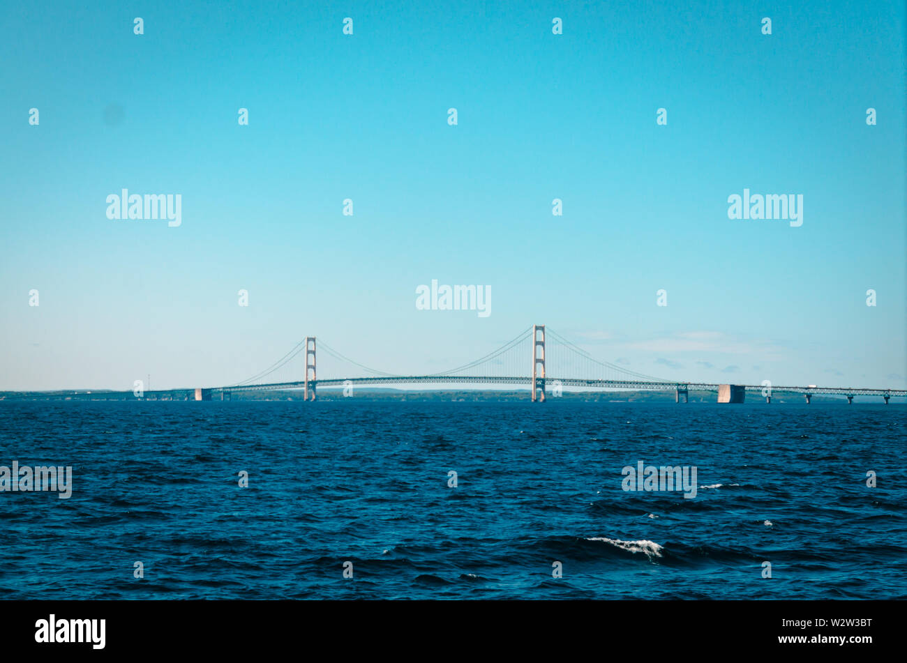 View of Mackinac Bridge on Lake Michigan Stock Photo - Alamy