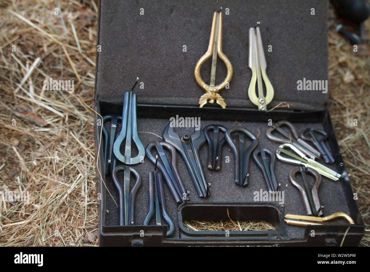 Closeup of a lot of jaw harps, khomuses, folk musical instruments ...