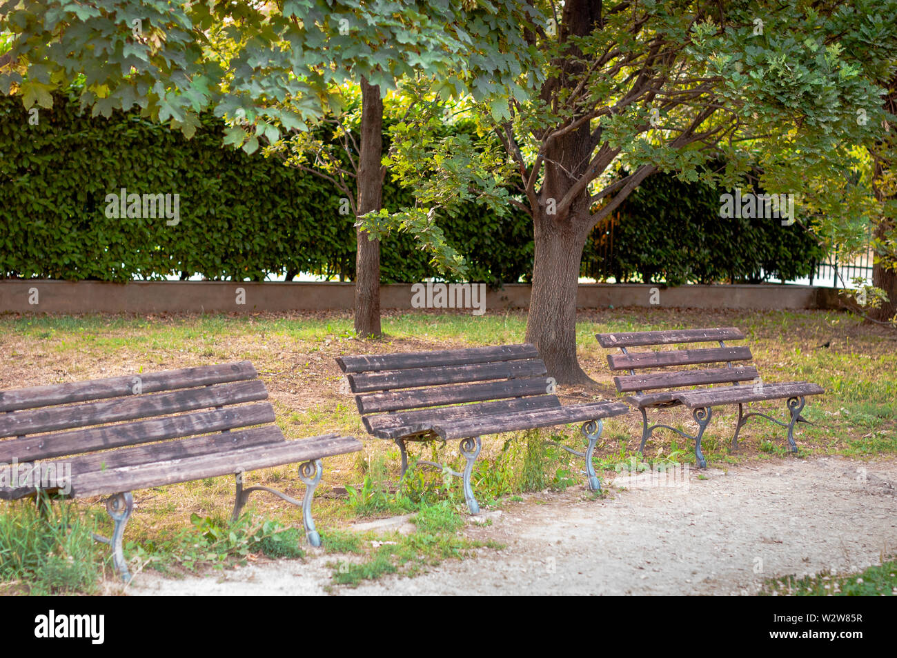 Three benches hi-res stock photography and images - Alamy