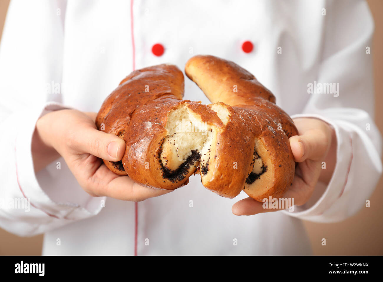 Female baker with pastry, closeup Stock Photo - Alamy