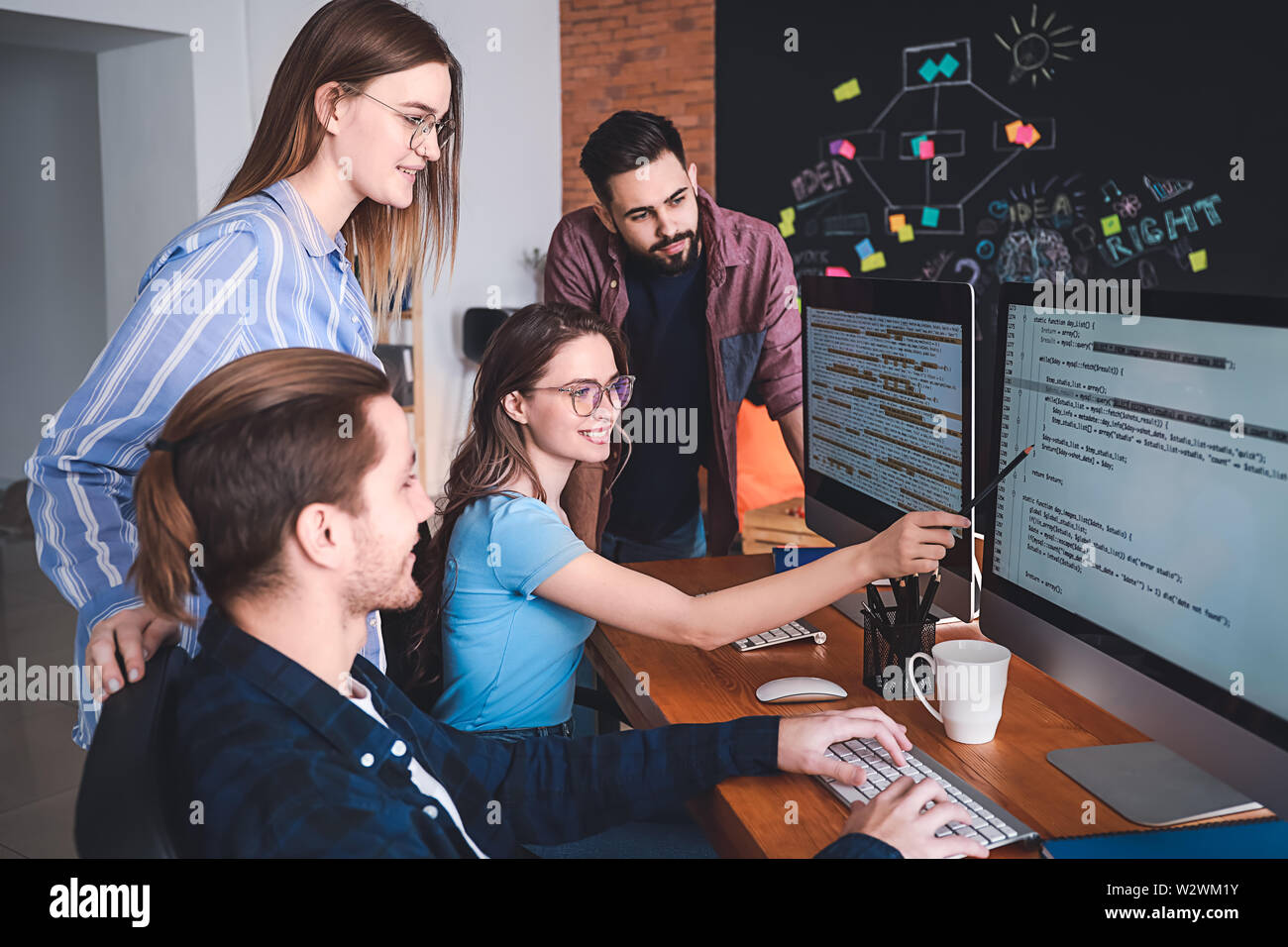 Female programmers working table hi-res stock photography and images ...