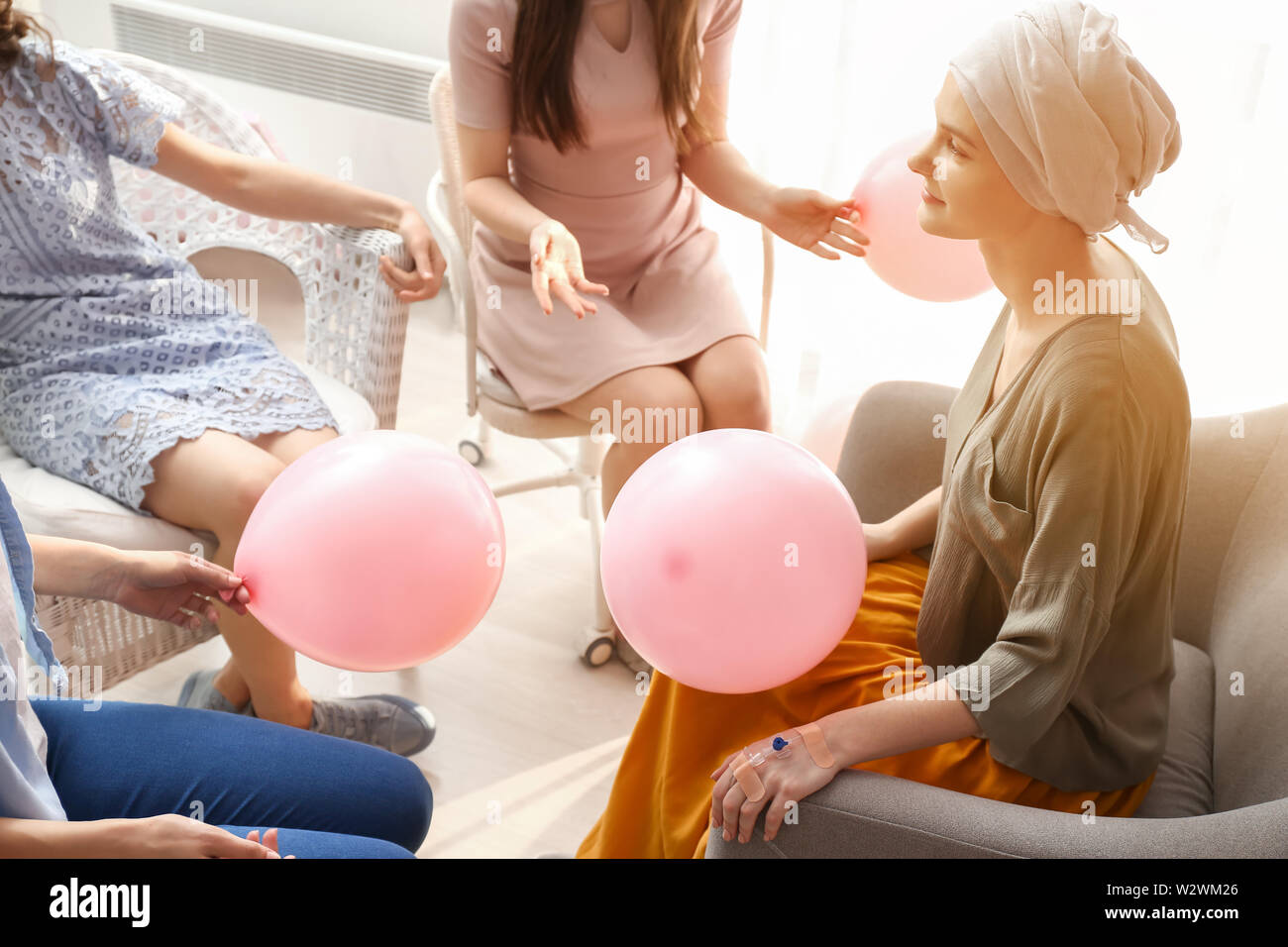 Women visiting friend after hi-res stock photography and images - Alamy