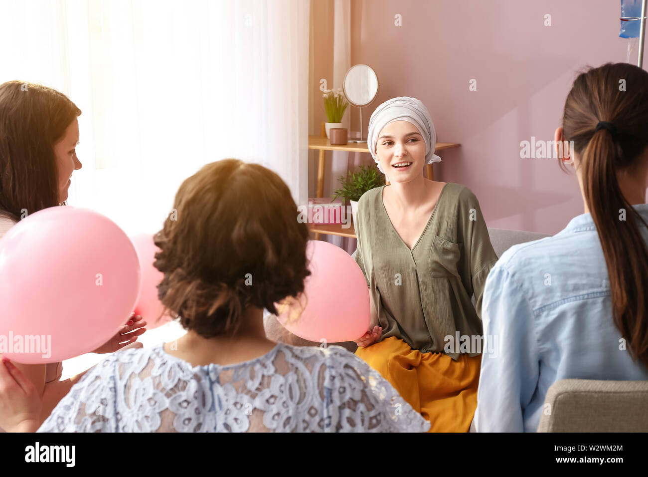 Women visiting friend after hi-res stock photography and images - Alamy