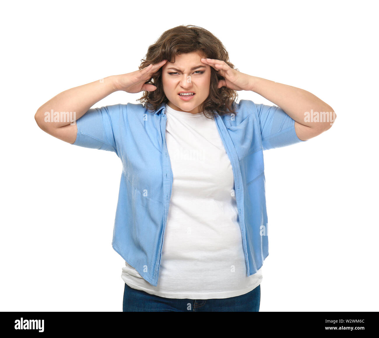 Stressed overweight woman on white background Stock Photo - Alamy