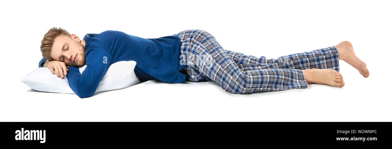 Handsome sleeping man with pillow on white background Stock Photo - Alamy