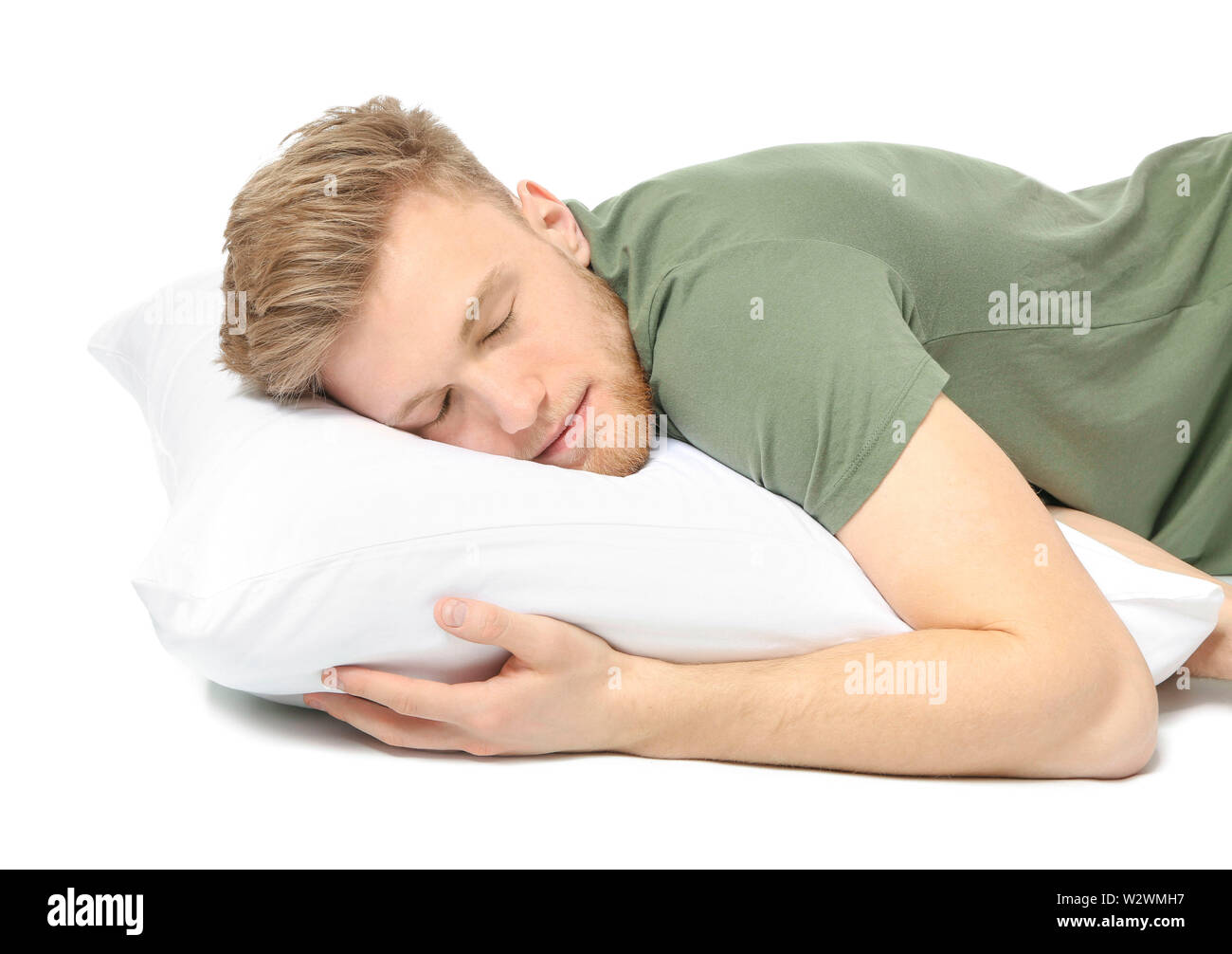 Handsome sleeping man on white background Stock Photo - Alamy