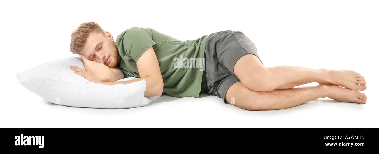 Handsome sleeping man on white background Stock Photo - Alamy