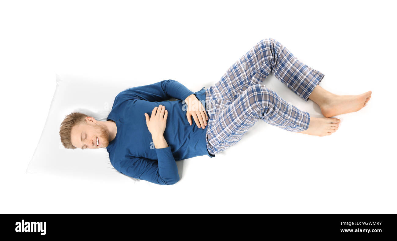 Handsome sleeping man on white background Stock Photo - Alamy