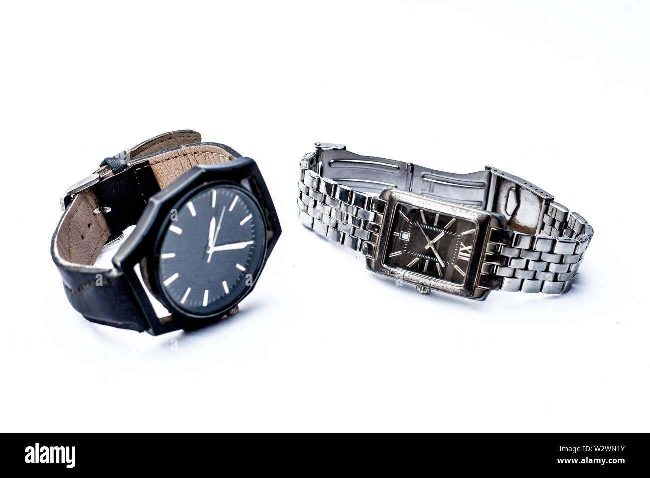 Close up of comparison of two wrist watches one of old or 20th century ...