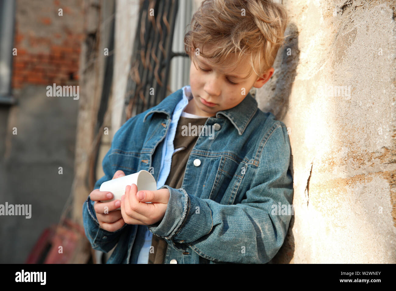 Boy counting coins hi-res stock photography and images - Alamy