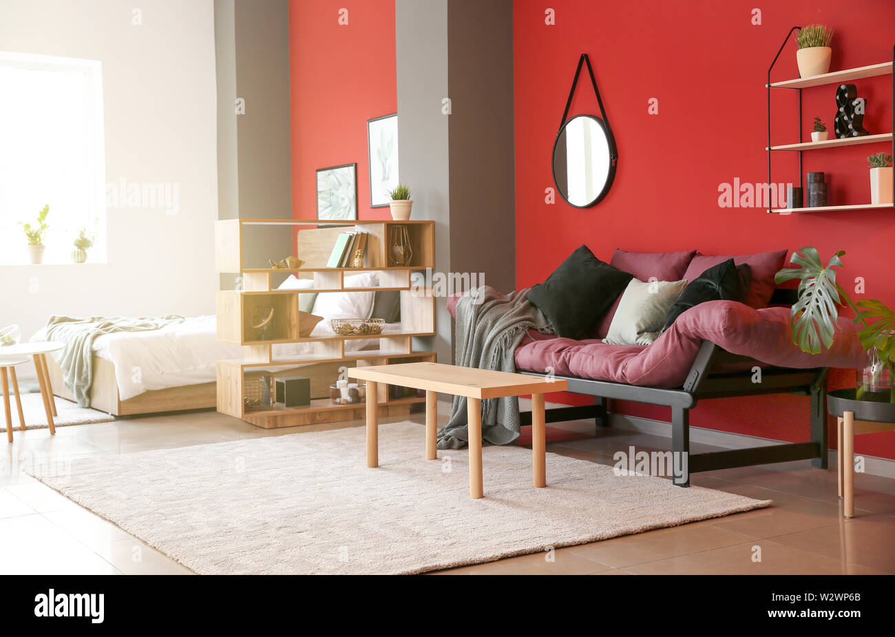 Interior of modern studio apartment Stock Photo - Alamy