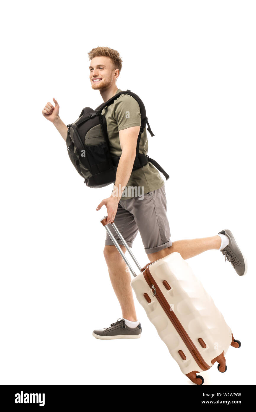 Running young tourist on white background Stock Photo - Alamy