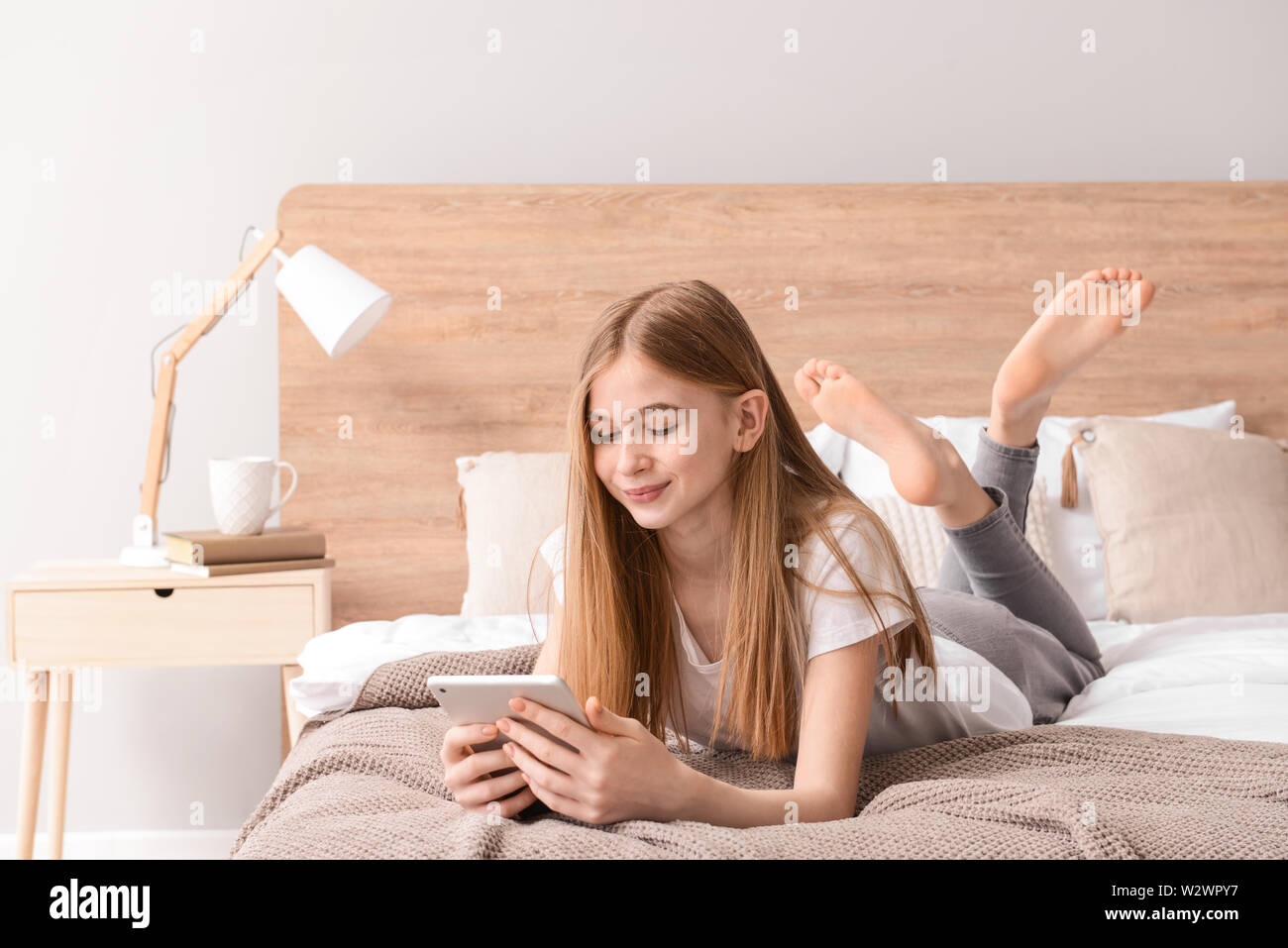 Girl in her bedroom hi-res stock photography and images - Alamy