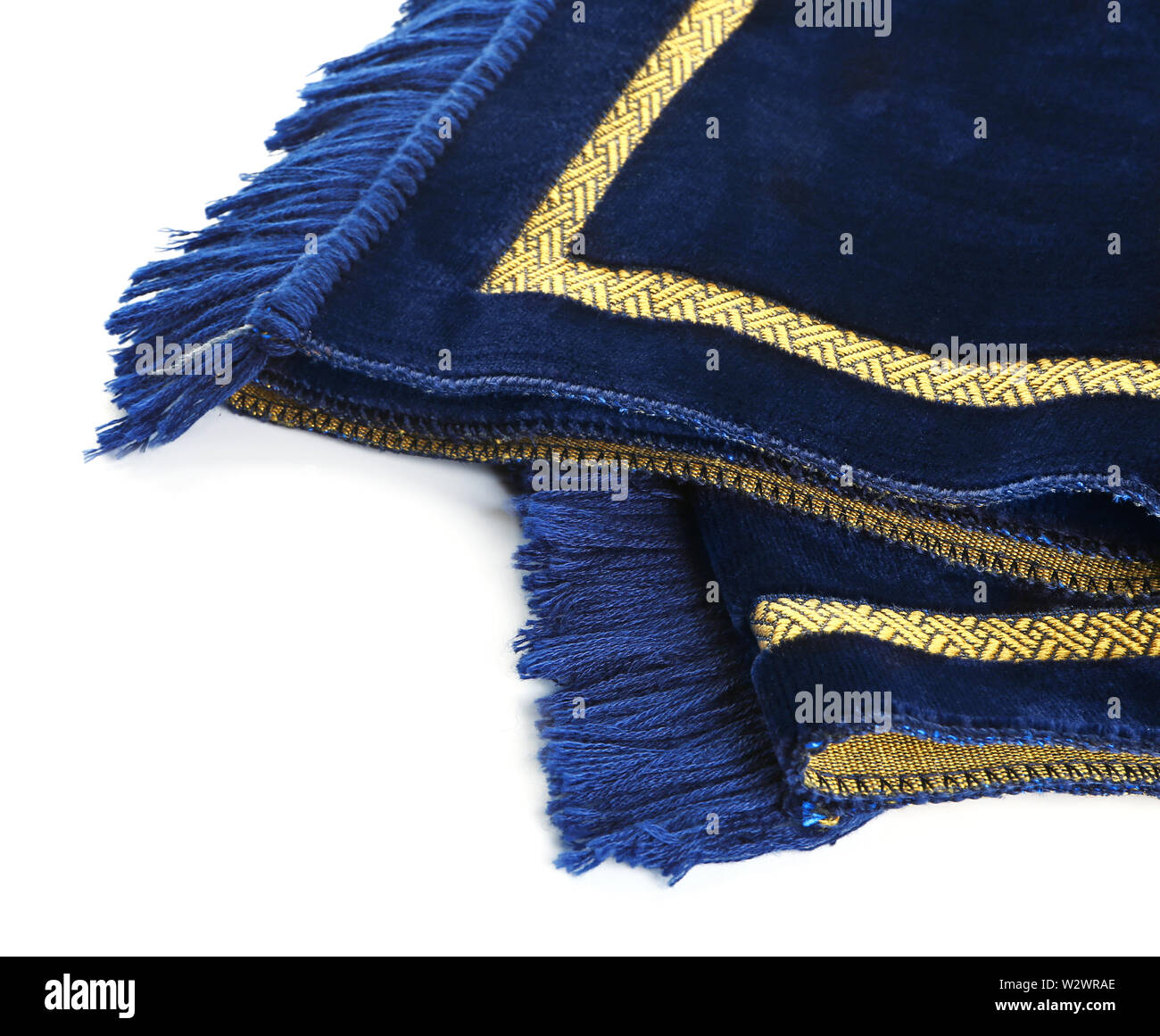 Muslim prayer mat on white background Stock Photo - Alamy