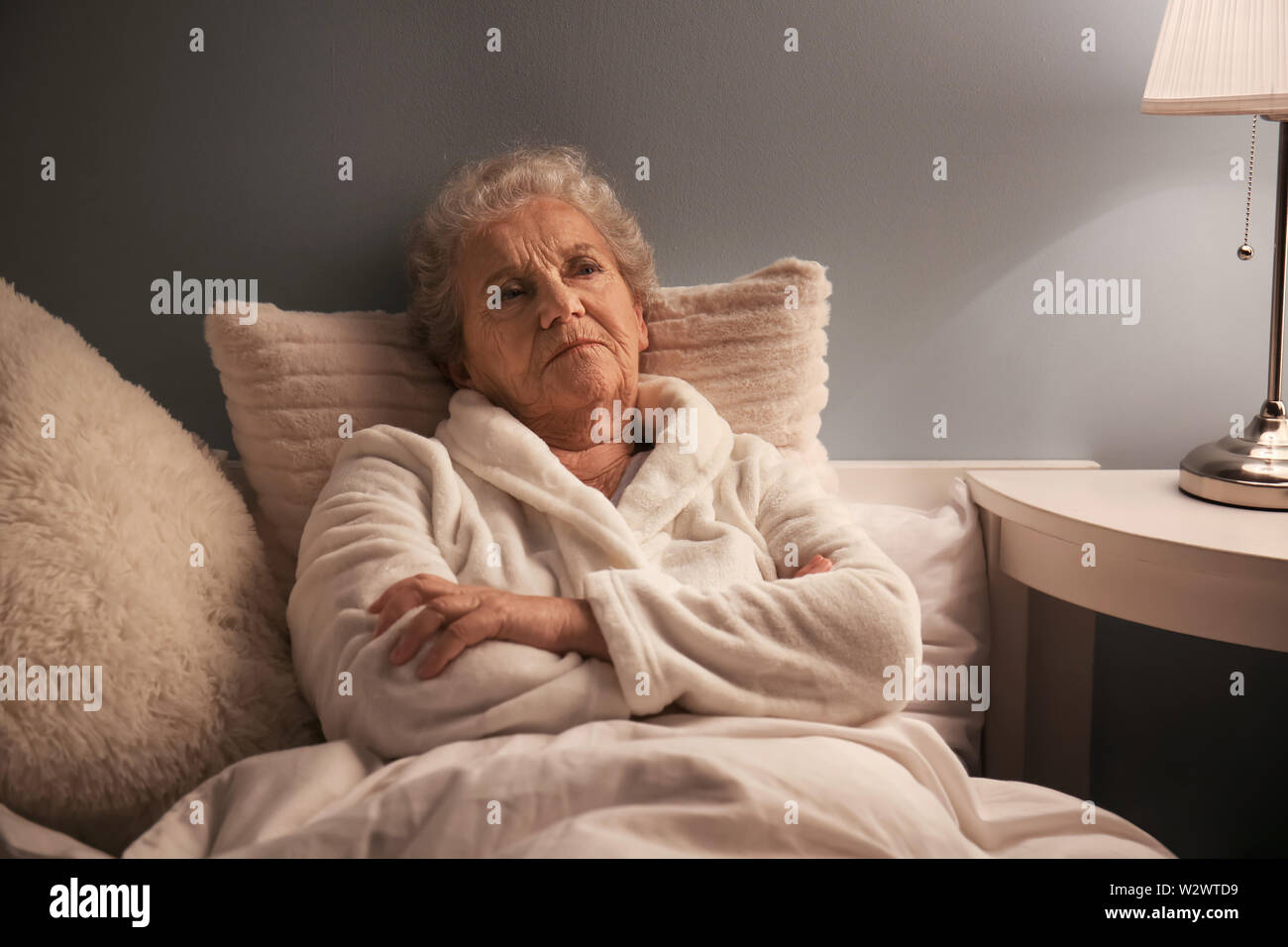 Elderly woman night bed alone hi-res stock photography and images - Alamy