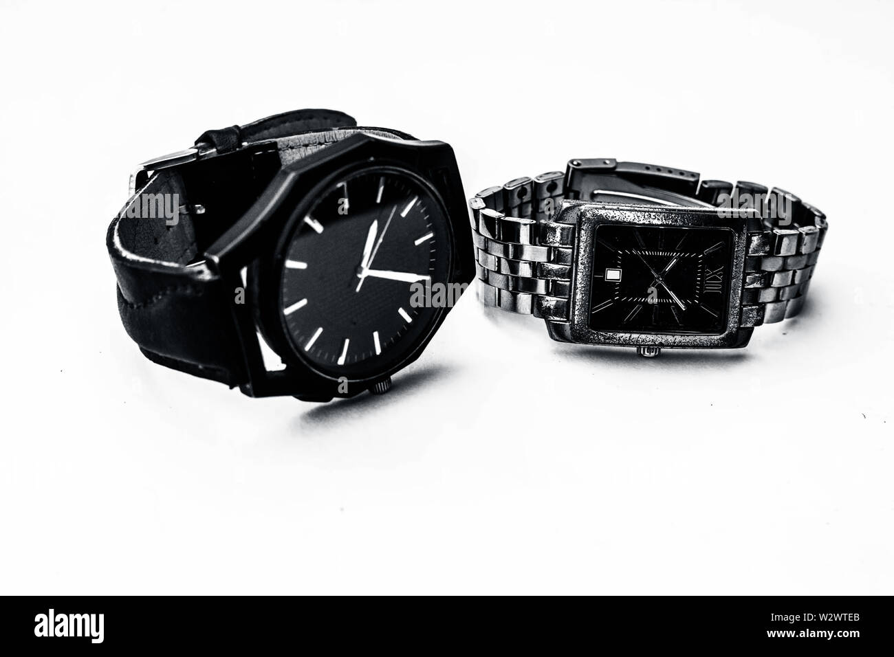 Close up of comparison of two wrist watches one of old or 20th century ...