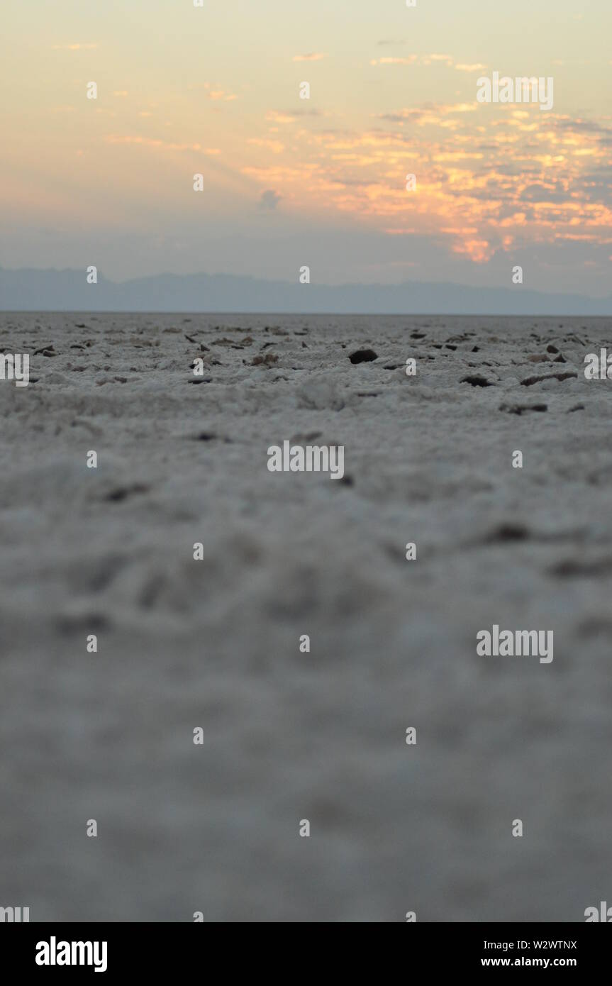Lake El Jerid. Sunrise in the desert. Atlas Mountains and the bottom of ...