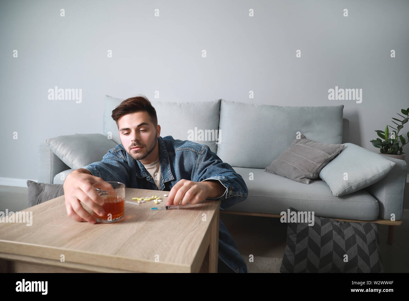 Man alcohol and drugs home hi-res stock photography and images - Alamy