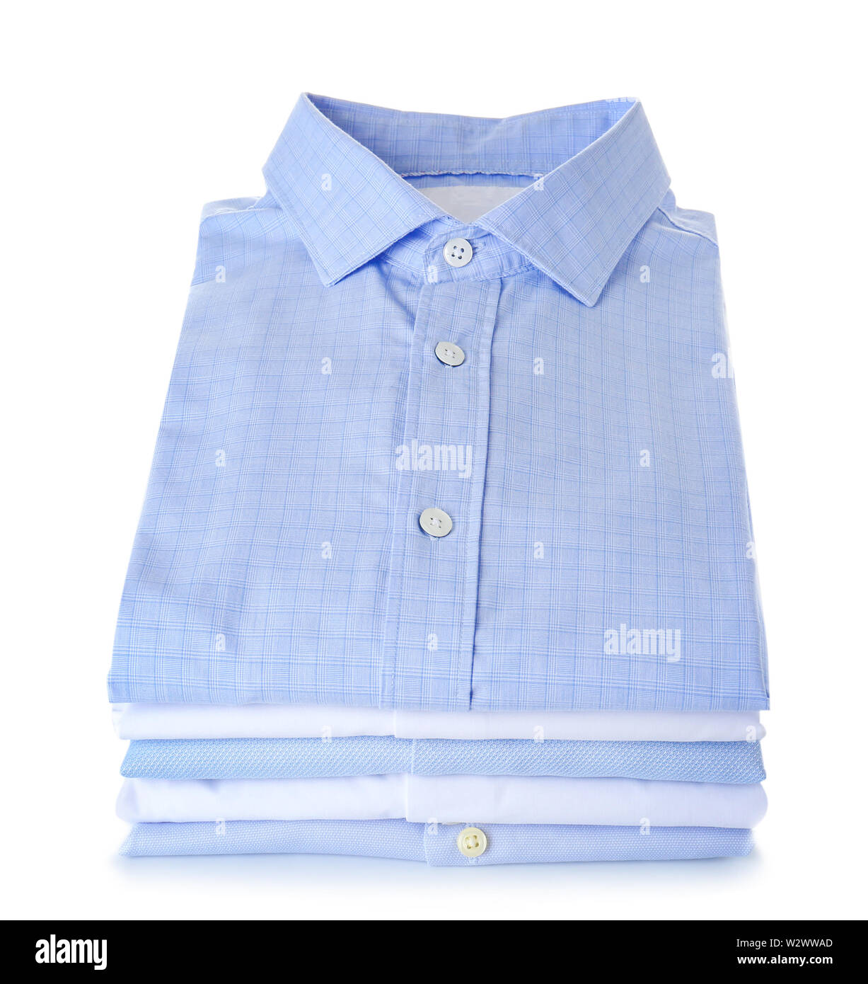 Stack of clean clothes on white background Stock Photo - Alamy