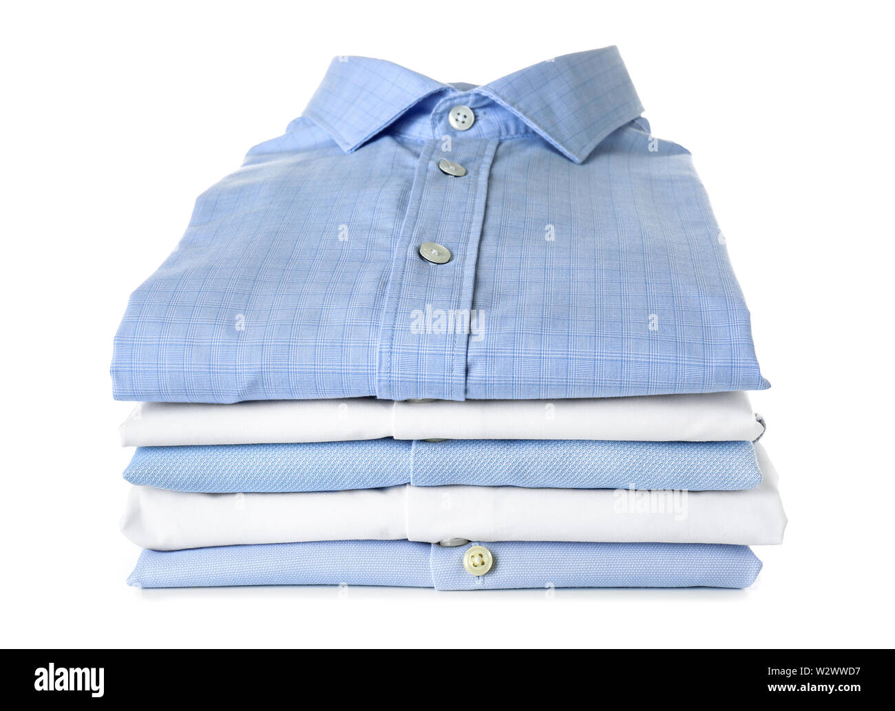 Stack of clean clothes on white background Stock Photo - Alamy