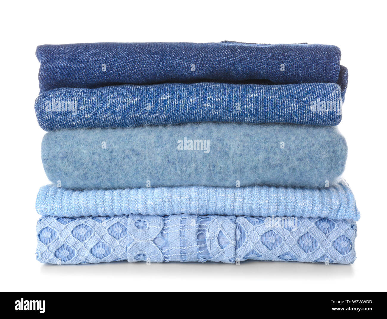 Stack of clean clothes on white background Stock Photo - Alamy