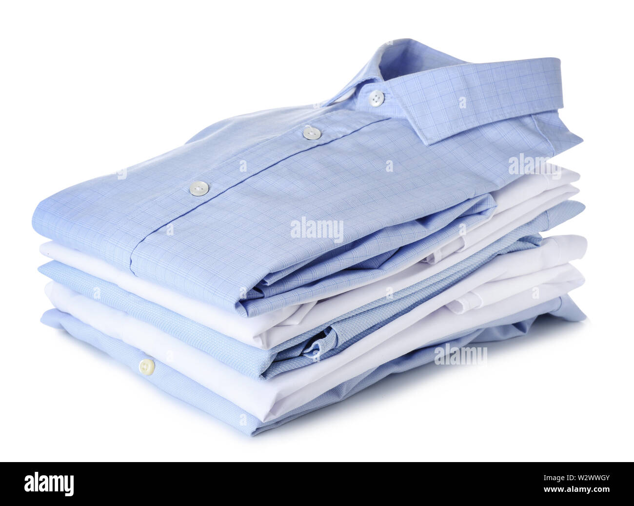 Stack of clean clothes on white background Stock Photo - Alamy