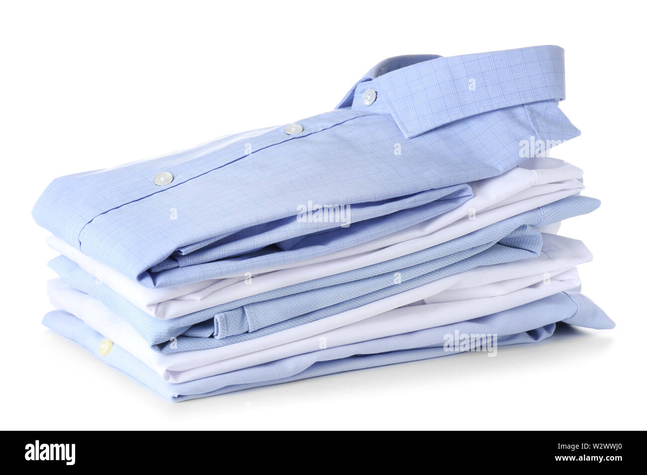 Stack of clean clothes on white background Stock Photo - Alamy