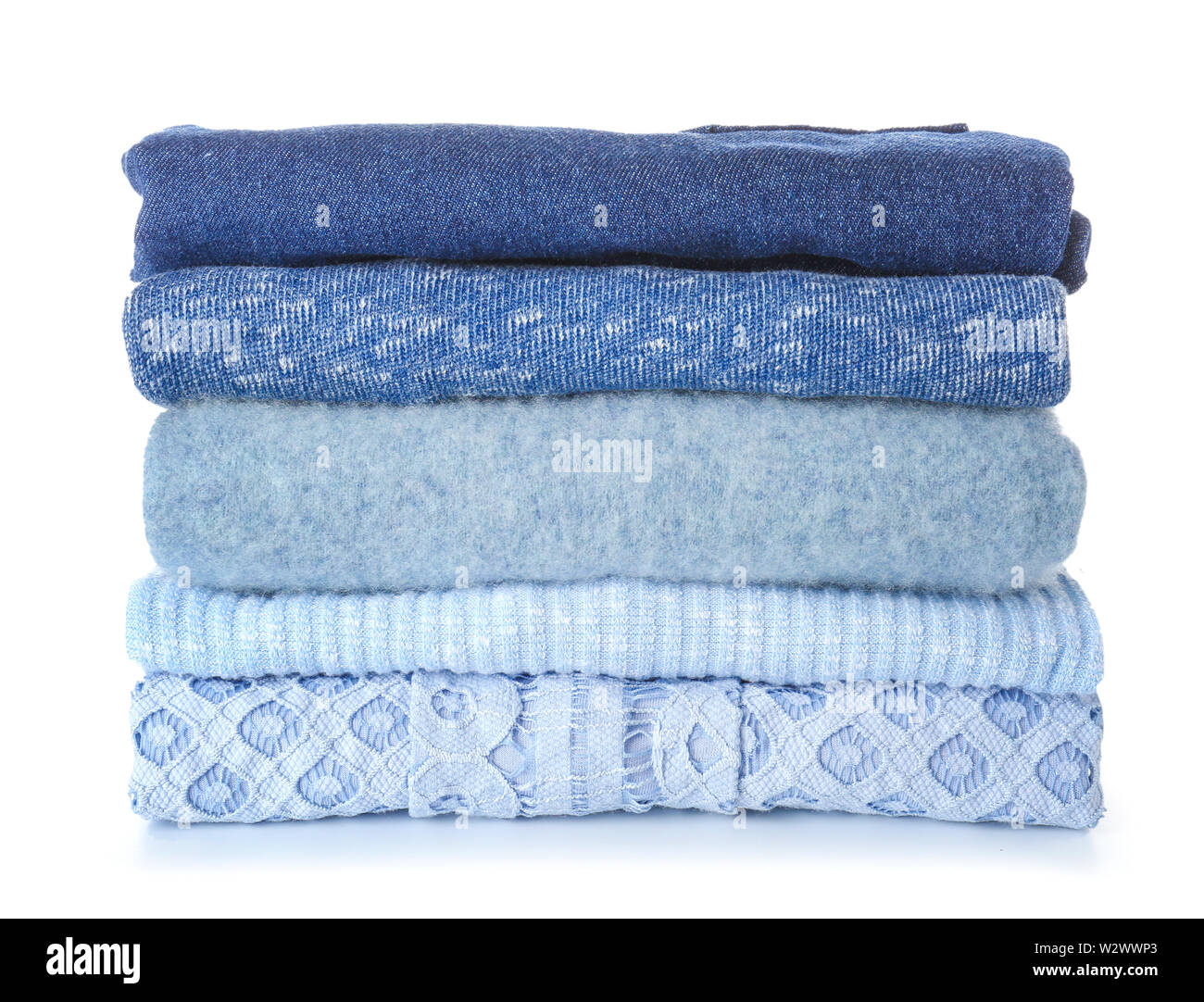 Stack of clean clothes on white background Stock Photo - Alamy
