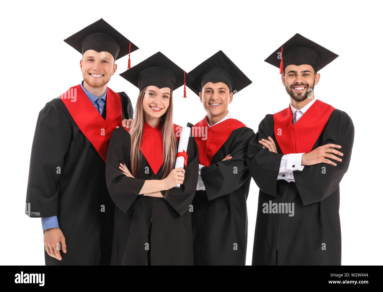 Young students in bachelor robes on white background Stock Photo - Alamy
