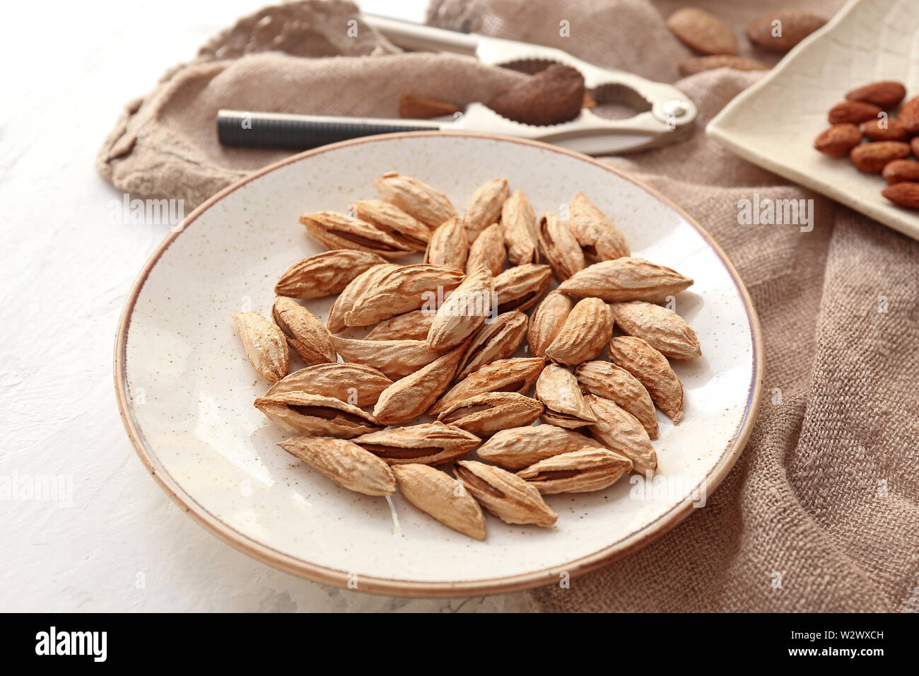 Almonds on table hi-res stock photography and images - Alamy