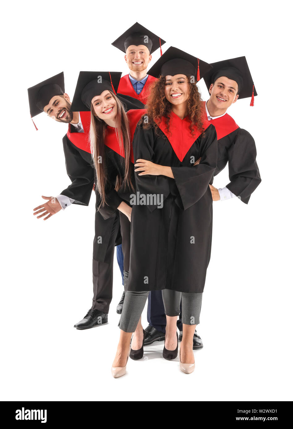 Young students in bachelor robes on white background Stock Photo - Alamy