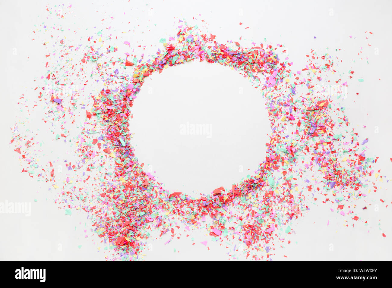 Frame made of colorful confetti on light background Stock Photo - Alamy