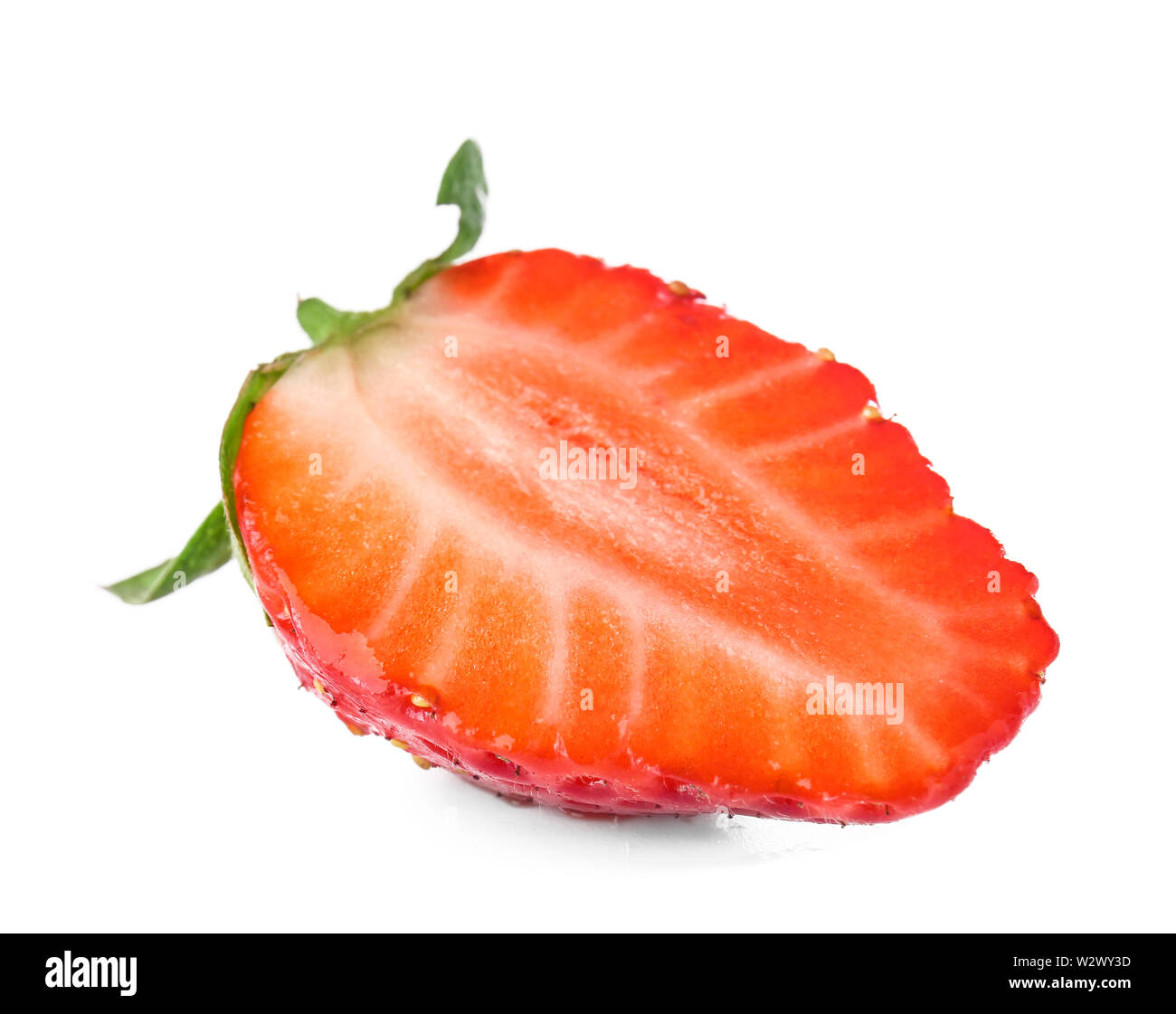 Half of ripe strawberry on white background Stock Photo - Alamy