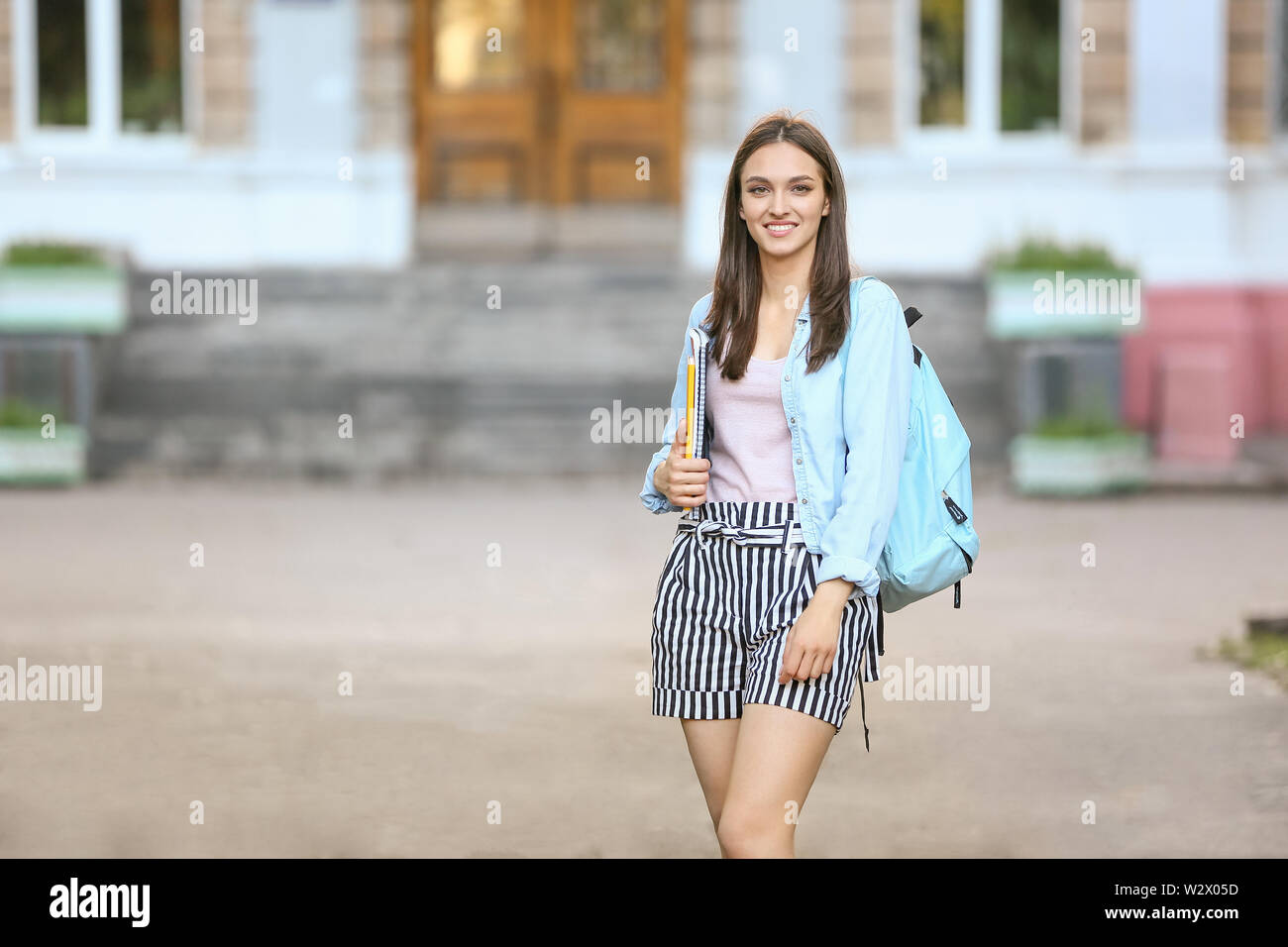 Portrait of beautiful female student outdoors Stock Photo - Alamy