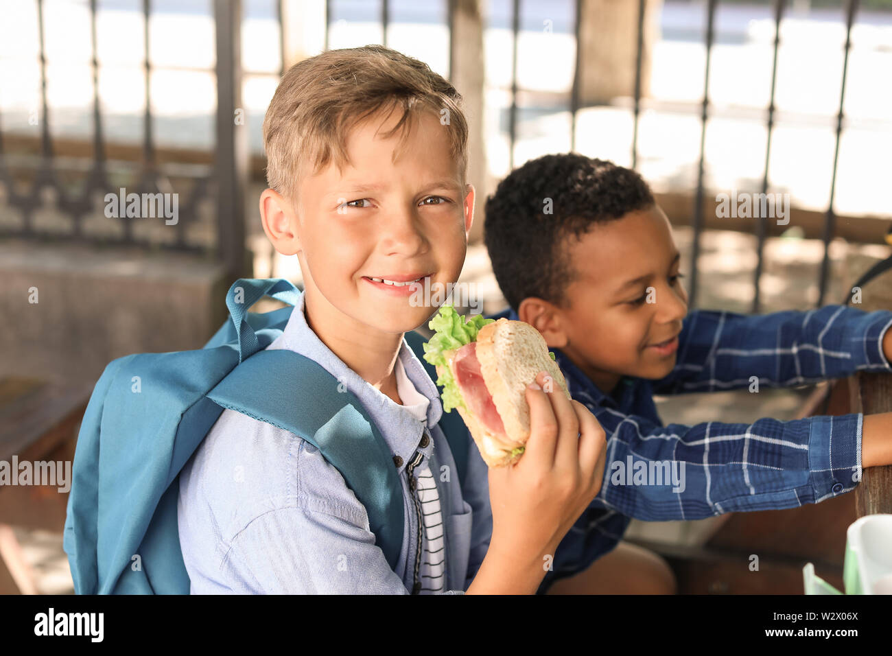Little children having lunch outdoors Stock Photo - Alamy