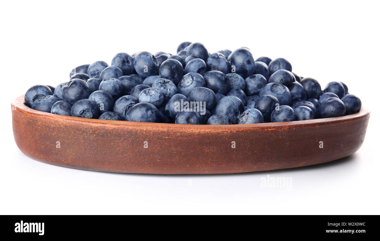Plate with ripe blueberry on white background Stock Photo - Alamy