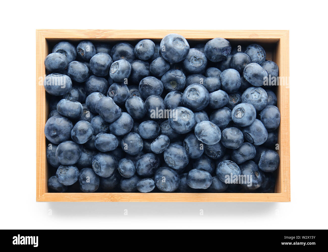 Box with ripe blueberry on white background Stock Photo - Alamy