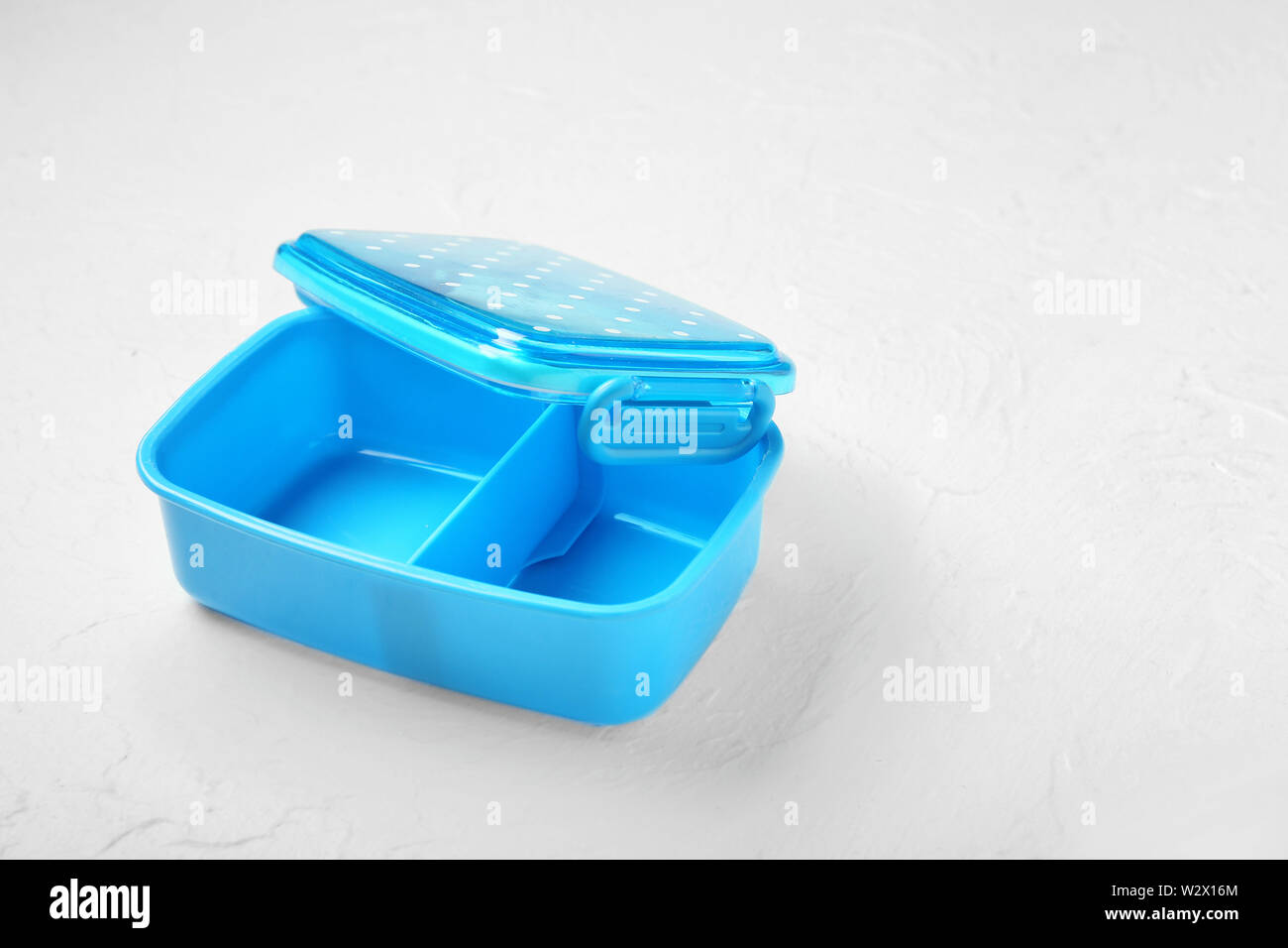 Empty school lunch box on white background Stock Photo - Alamy