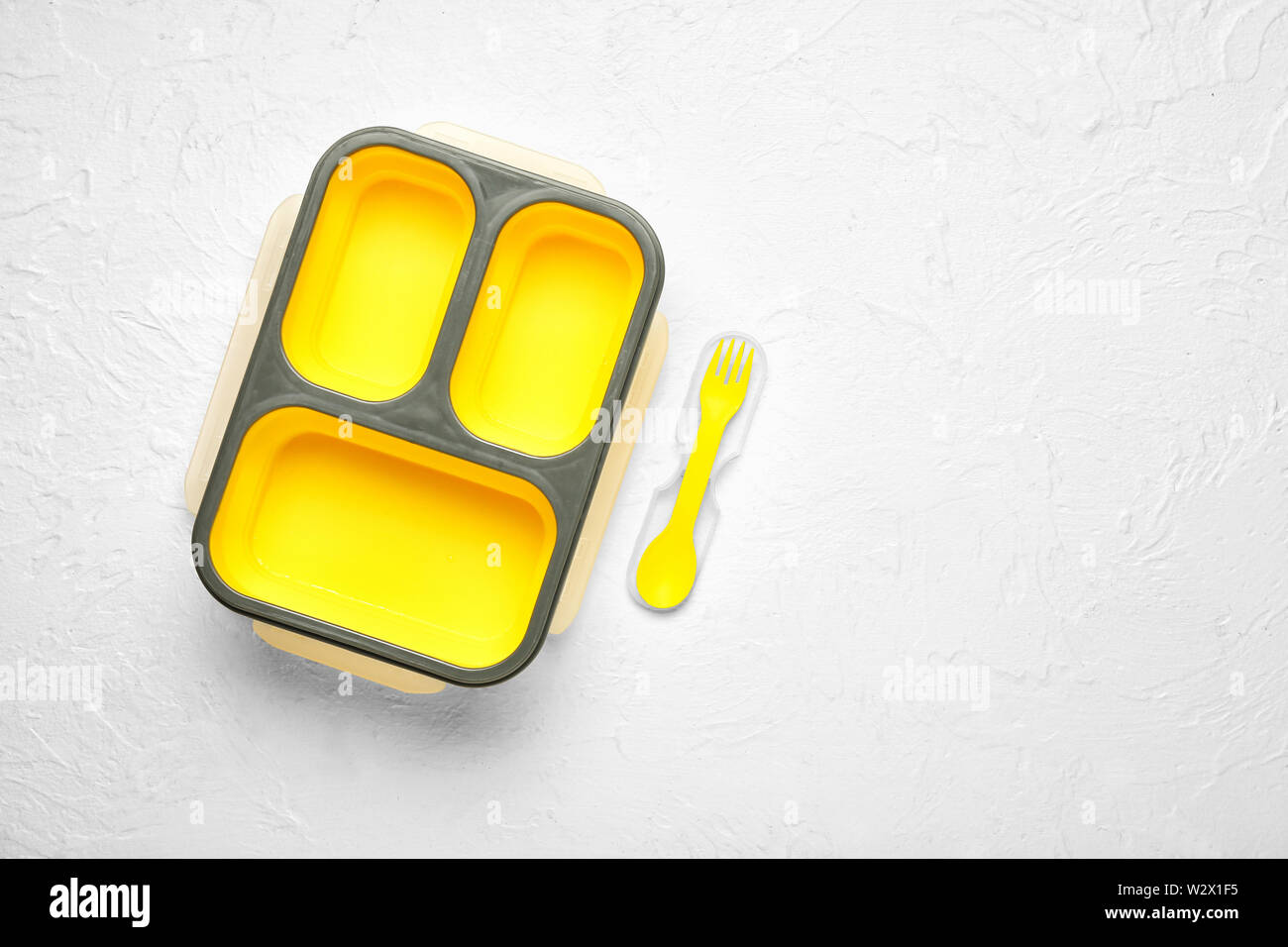 Empty school lunch box on white background Stock Photo - Alamy