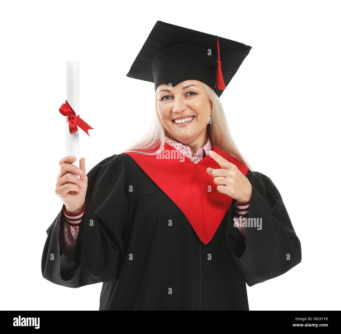 Mature woman in bachelor robe on white background Stock Photo - Alamy