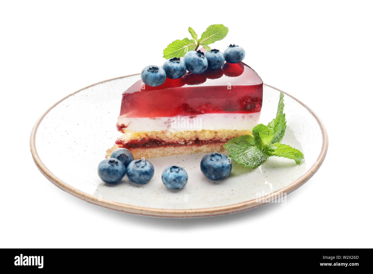 Tasty blueberry cheesecake on white background Stock Photo - Alamy
