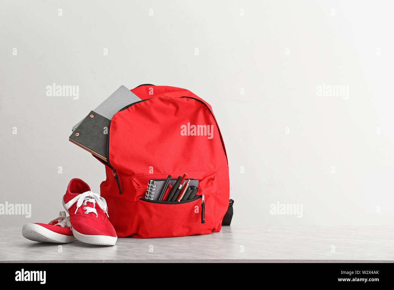 Backpack with shoes hi-res stock photography and images - Alamy