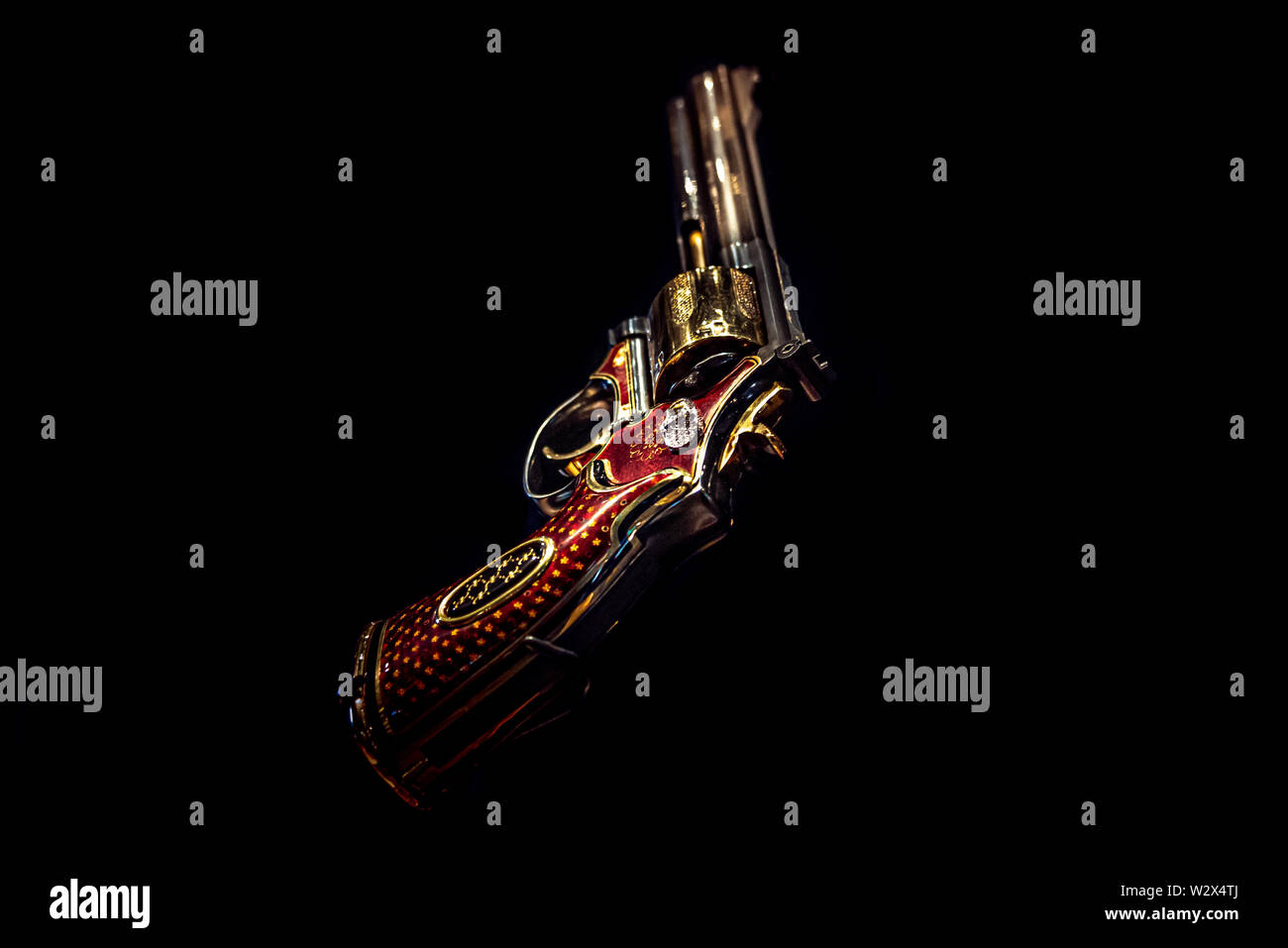 LONDON,ENGLAND,DECEMBER 10th,2018: pistol revolver isolated on black ...