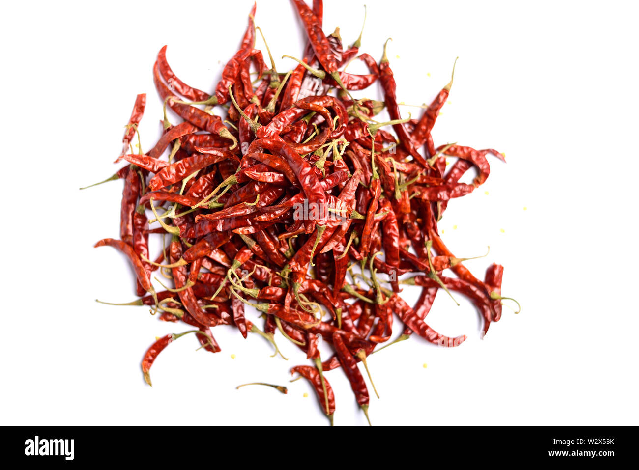 stack of red chili peppers isolated on white background Stock Photo - Alamy