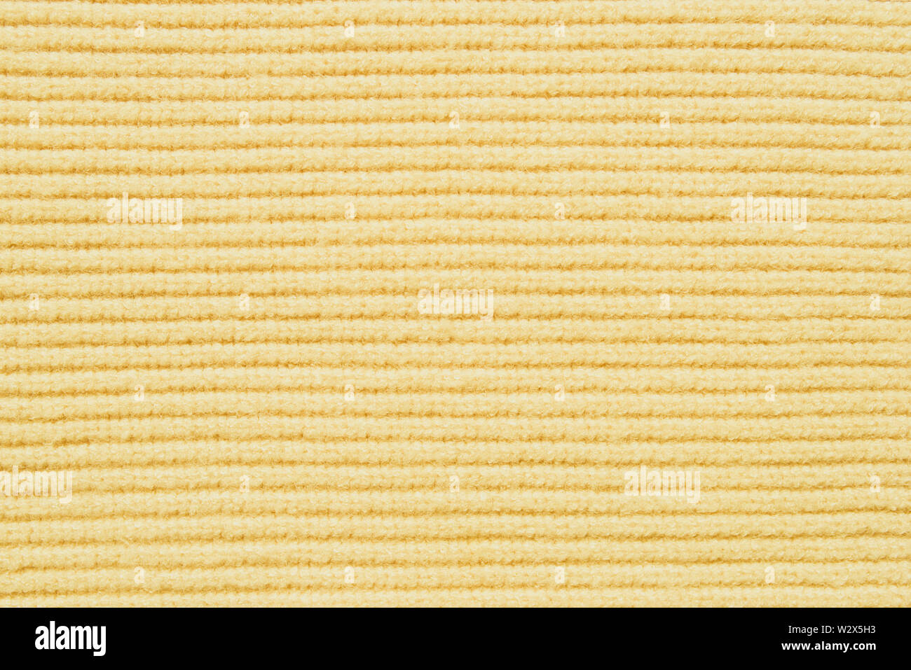 Light yellow knitting wool texture background Stock Photo - Alamy