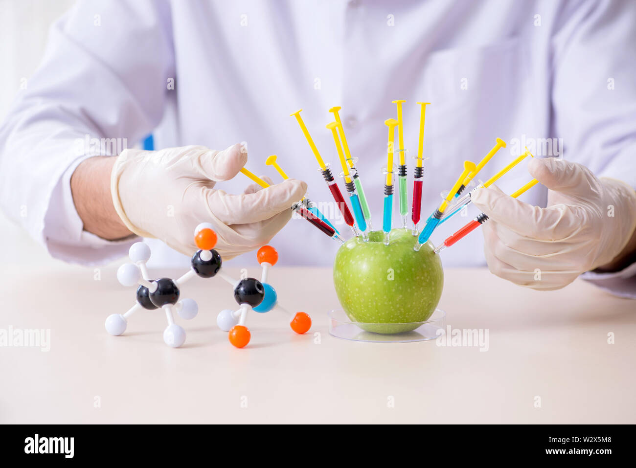The male nutrition expert testing food products in lab Stock Photo - Alamy