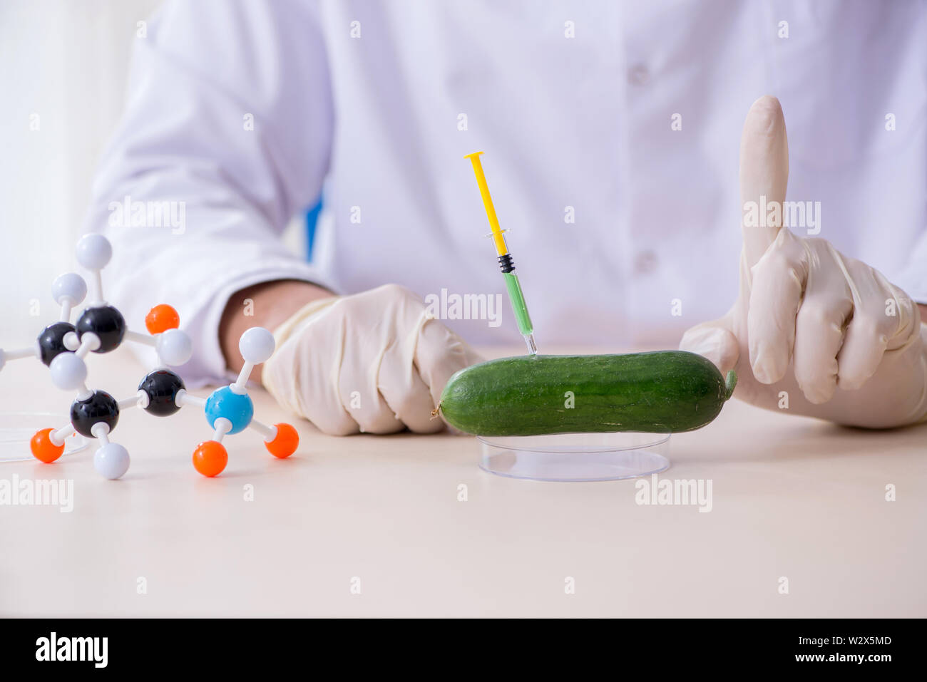 The male nutrition expert testing food products in lab Stock Photo - Alamy
